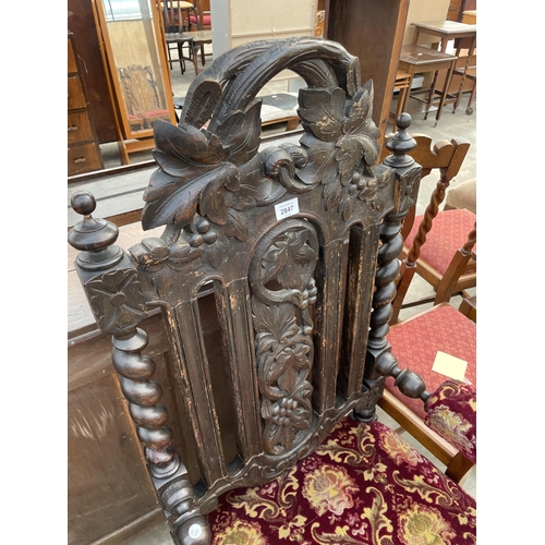 A VICTORIAN OAK JACOBEAN STYLE HEAVILY CARVED ELBOW CHAIR WITH ...