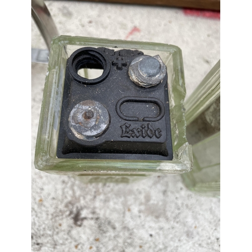 THREE VINTAGE GLASS CAR BATTERIES