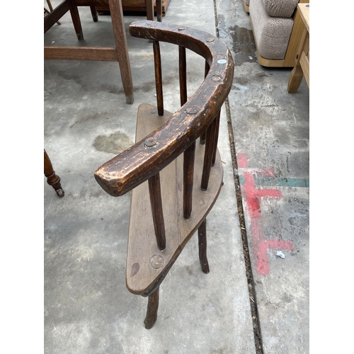 A PRIMITIVE IRISH STYLE RUSTIC STICK CHAIR
