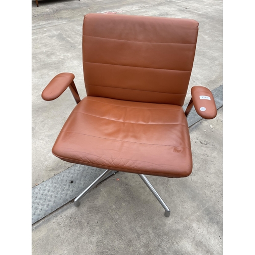 A BOSS DESIGN GROUP LEATHER SWIVEL CHAIR ON POLISHED ALLOY BASE