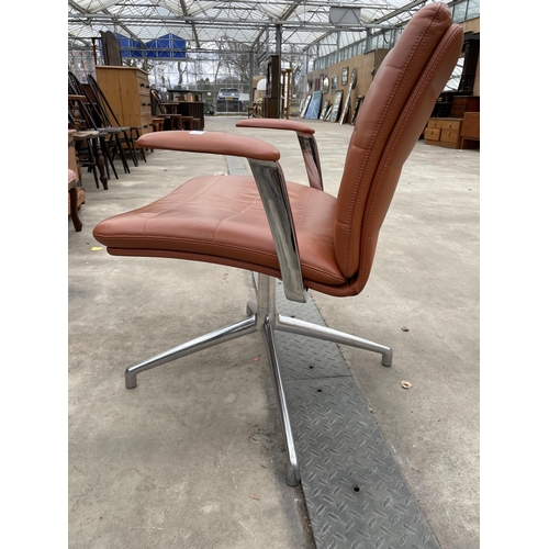 A BOSS DESIGN GROUP LEATHER SWIVEL CHAIR ON POLISHED ALLOY BASE