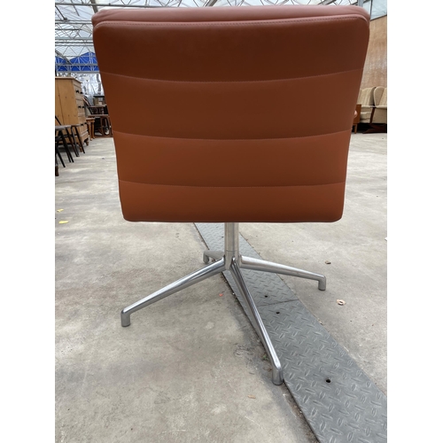 A BOSS DESIGN GROUP LEATHER SWIVEL CHAIR ON POLISHED ALLOY BASE