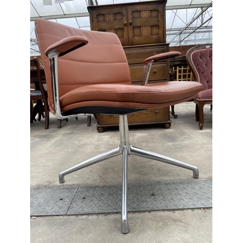 A BOSS DESIGN GROUP LEATHER SWIVEL CHAIR ON POLISHED ALLOY BASE