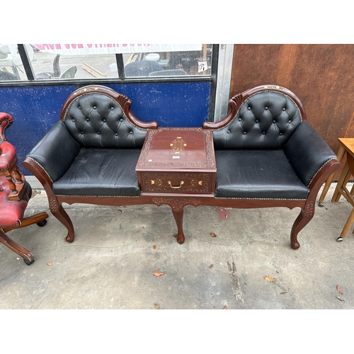 A BRASS INLAID INDIAN HARDWOOD AND BUTTONED LEATHER SCROLL END ...