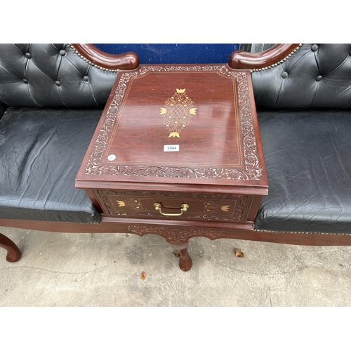 A BRASS INLAID INDIAN HARDWOOD AND BUTTONED LEATHER SCROLL END ...
