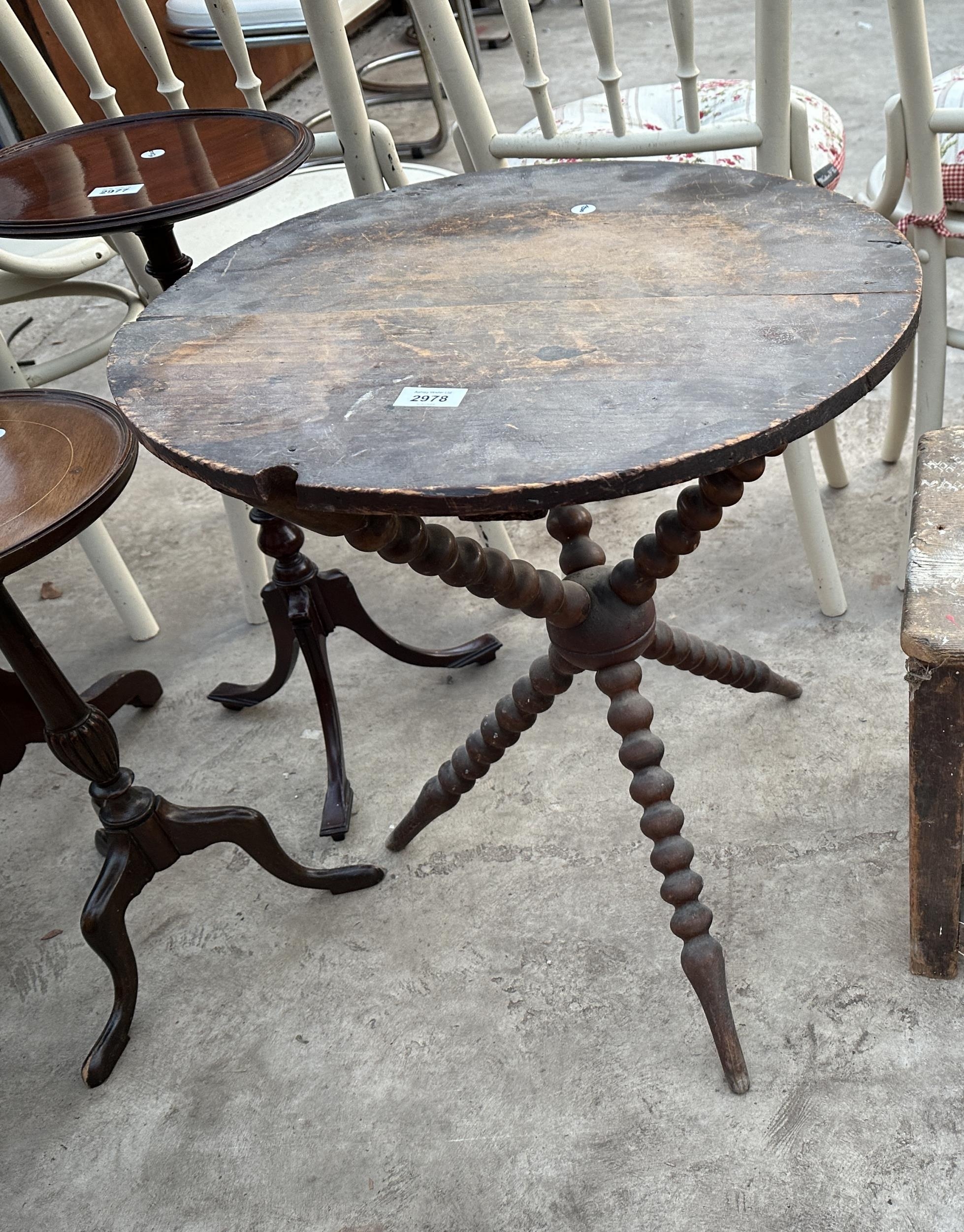 A VICTORIAN BEECH GYPSIES' TABLE ON BOBBIN TURNED TRIPOD SUPPORTS