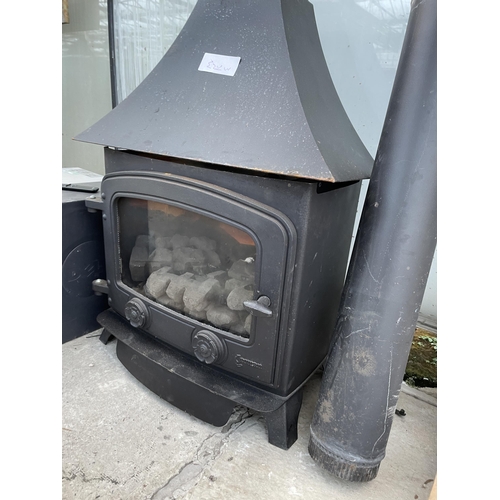 A CAST IRON LOG BURNER WITH FLU