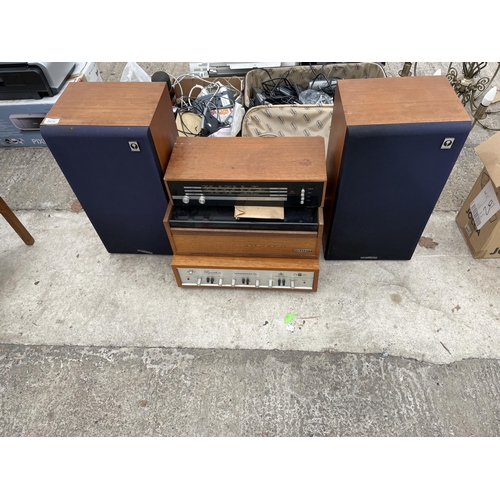 A RETRO TEAK DYNATRON STEREO SYSTEM WITH A PAIR OF WHARFEDALE SPEAKERS