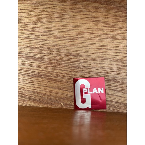 A RETRO TEAK G-PLAN UNIT ENCASING DRAWER AND CUPBOARD 33" WIDE