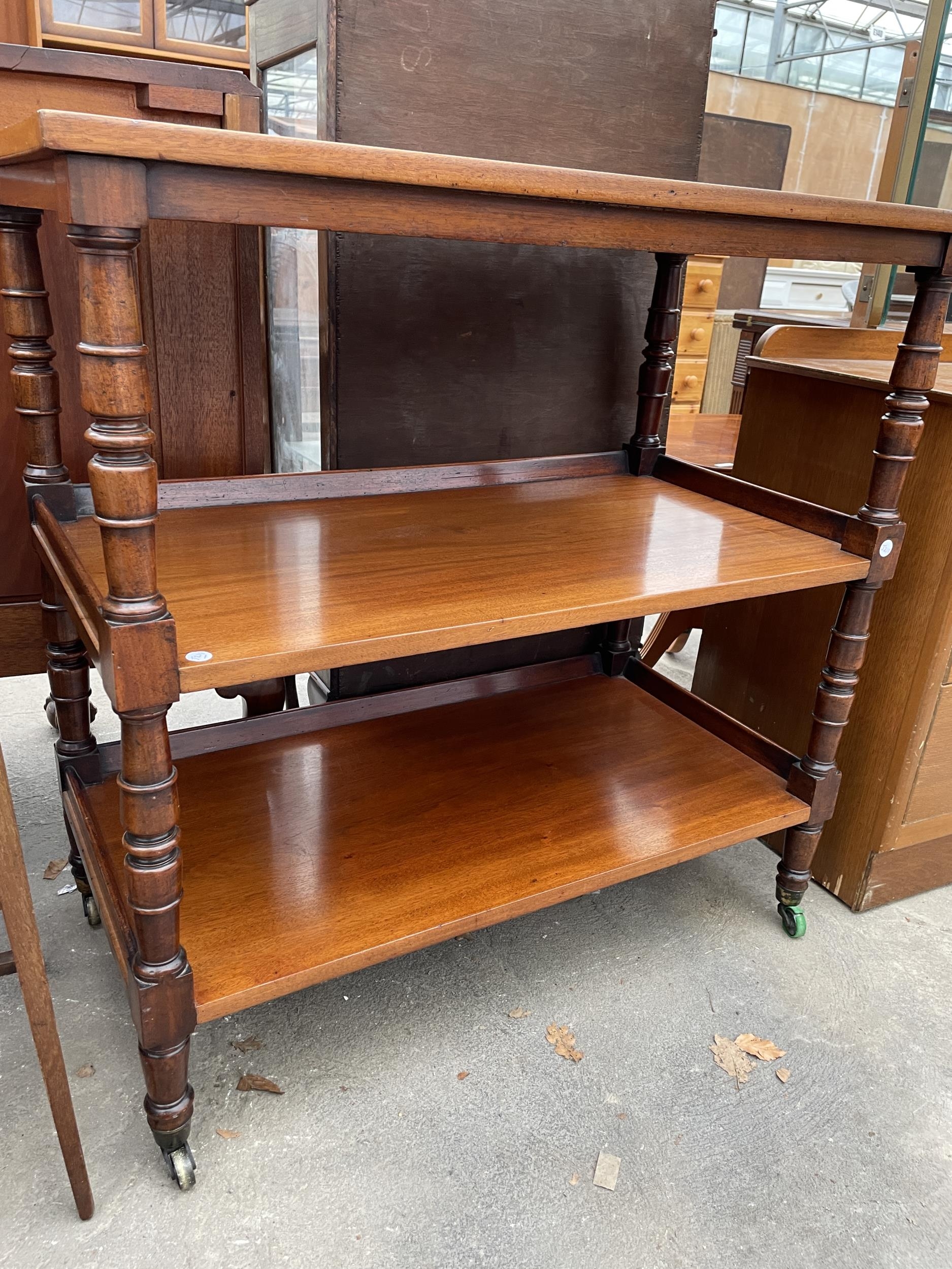 A LATE VICTORIAN MAHOGANY THREE TIER BUFFET TROLLEY ON BRASS CASTERS 35 ...