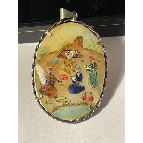 A VINTAGE HAND PAINTED ABALONE SHELL IN A SILVER MOUNT IN A ...