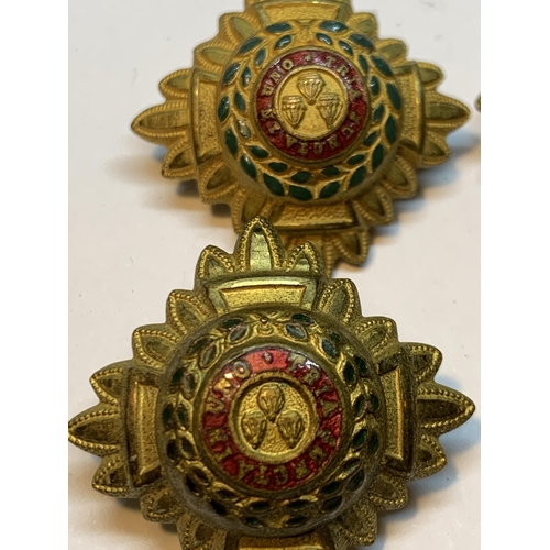 FOUR MILITARY METAL PIP BADGES