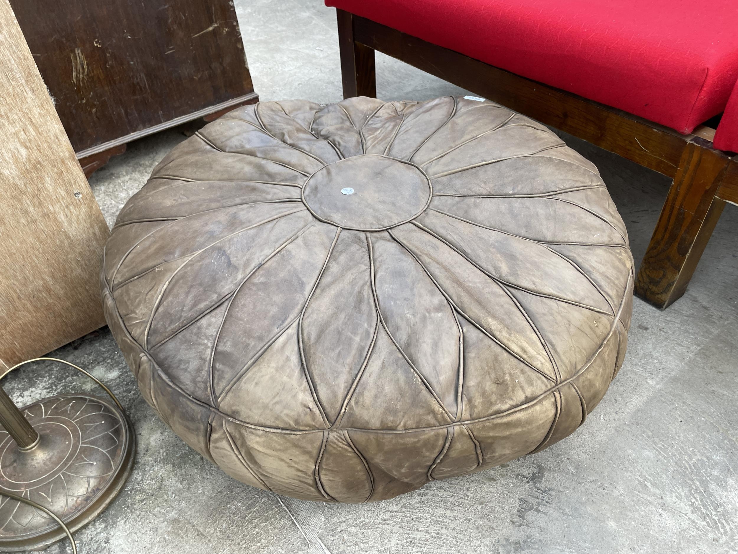 A LEATHER POUFEE - 31 INCH DIAMETER