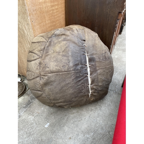 A LEATHER POUFEE - 31 INCH DIAMETER