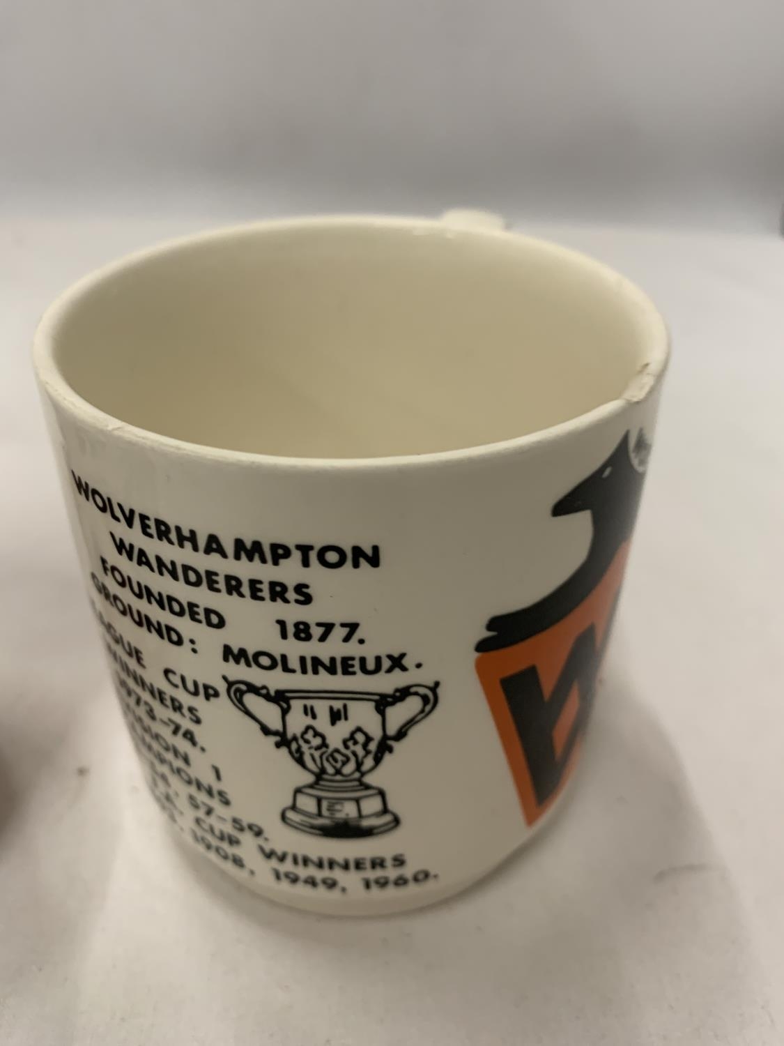 THREE WOLVERHAMPTON WANDERERS MUGS FROM THE 1960'S, 1970'S AND 1980'S