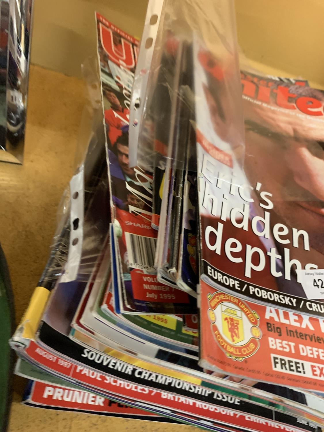 A COLLECTION OF MANCHESTER UNITED OFFICIAL MAGAZINES - APPROX 49 IN TOTAL