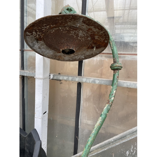 A VINTAGE CAST IRON OUTDOOR LAMP POST WITH SWAN NECK