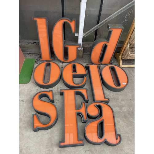 A SET OF ASSORTED PERSPEX SIGN MAKING LETTERS AND NUMBERS
