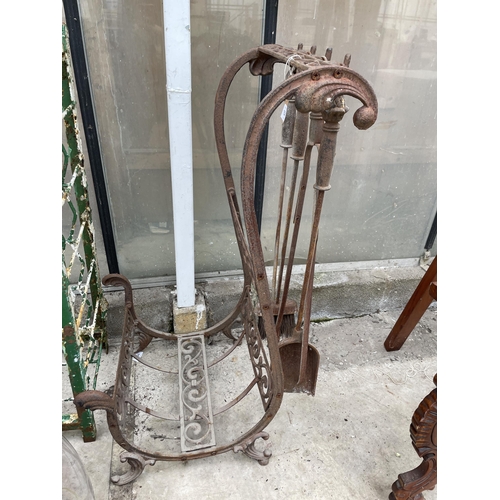 A VINTAGE STEEL COMPANION SET WITH LOG STAND