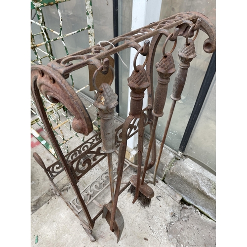 A VINTAGE STEEL COMPANION SET WITH LOG STAND