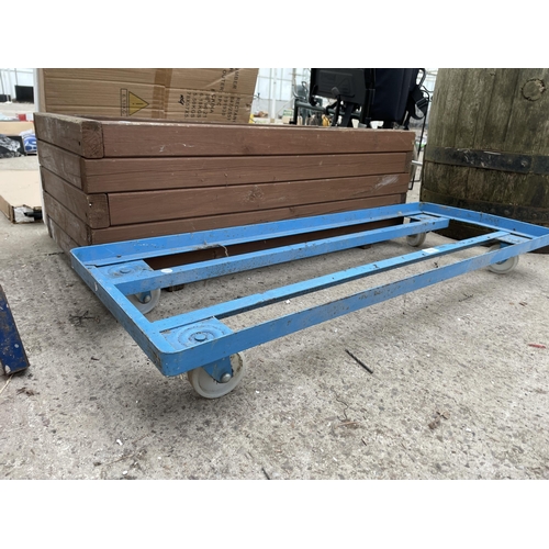 A METAL TROLLEY BASE AND A WOODEN TROUGH PLANTER