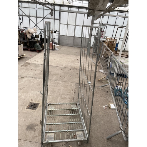 A LARGE METAL WAREHOUSE FOUR WHEELED CAGE