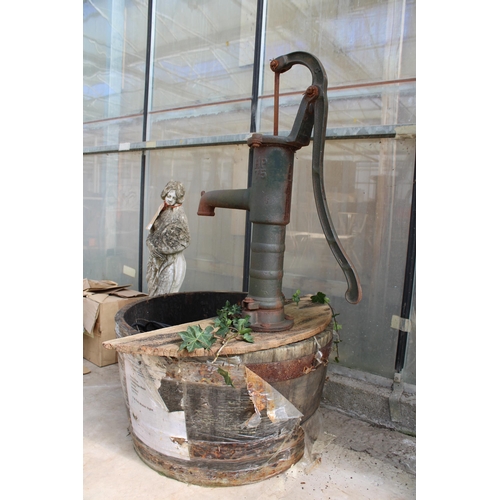 A VINTAGE WOODEN BARREL WATER FEATURE WITH VINTAGE CAST IRON WATER PUMP ...