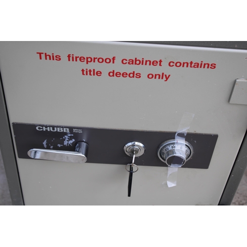 A CHUBB FIREPROOF SAFE COMPLETE WITH KEY