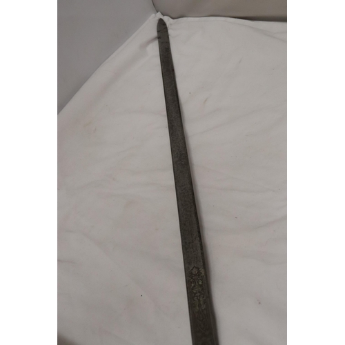 A VINTAGE SWORD WITH A BASKET HILT AND ENGRAVING TO THE TOP OF THE BLADE