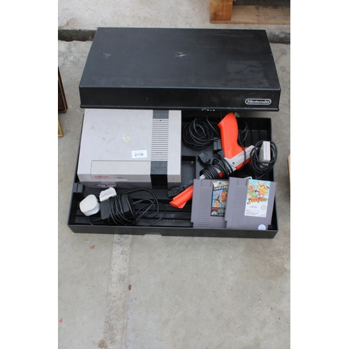 A NINTENDO ENTERTAINMENT SYSTEM GAMES CONSOLE WITH CONTROLLERS AND TWO ...