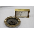 A VINTAGE BRASS, GERMAN MANTLE CLOCK, A LARGE PHILIPS LAMPS ASHTRAY ...