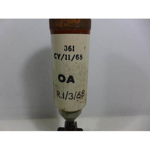 A 20TH CENTURY INERT MORTAR SHELL, A GUN CLEANING KIT AND AN ANTI GAS TIN