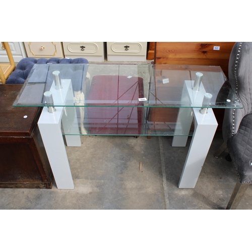 A MODERN GLASS TWO TIER TABLE ON GREY PAINTED LEGS, 43" X 16"