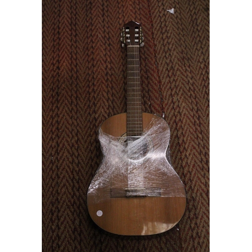 A STRUNAL CLASSICAL ACOUSTIC GUITAR