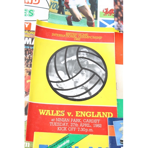 AN ASSORTMENT OF VINTAGE AND RETRO INTERNATIONAL FOOTBALL PROGRAMMES TO ...
