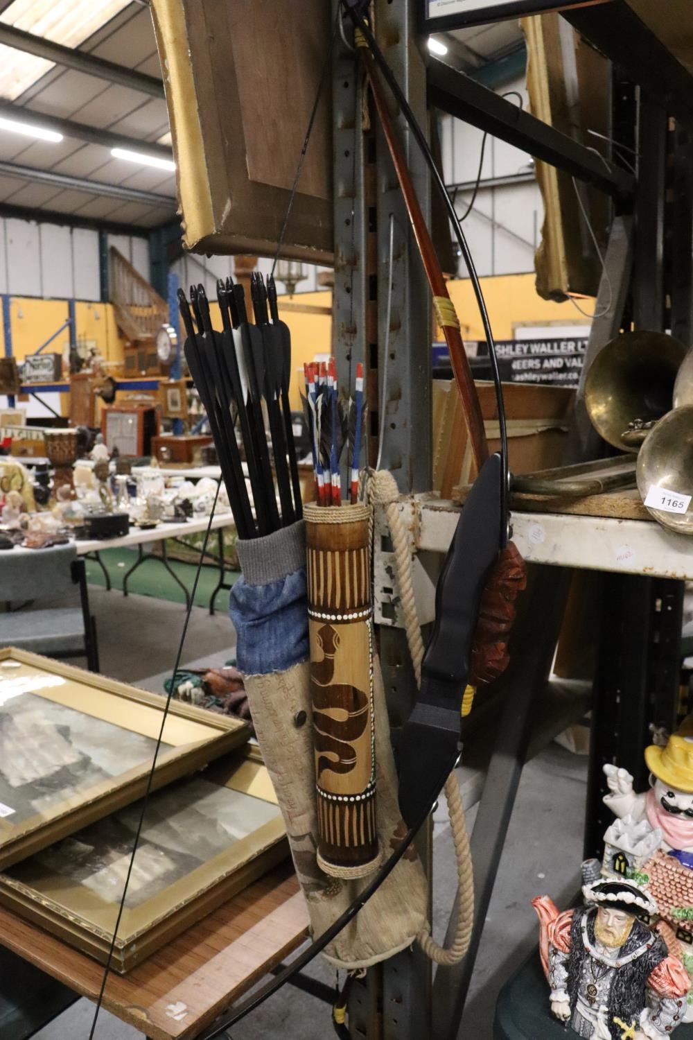 TWO BOWS AND TWO QUIVERS WITH ARROWS