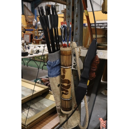 TWO BOWS AND TWO QUIVERS WITH ARROWS