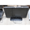 A LOGIK 26" TELEVISION WITH REMOTE CONTROL