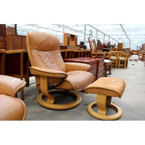 A STRESSLESS EKORNES TANNED LEATHER SWIVEL RECLINER WITH STOOL