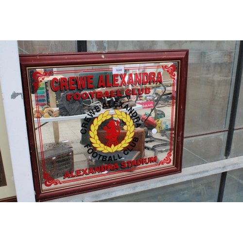 A WOODEN FRAMED MONGRAMED CREWE ALEXANDRA MIRROR