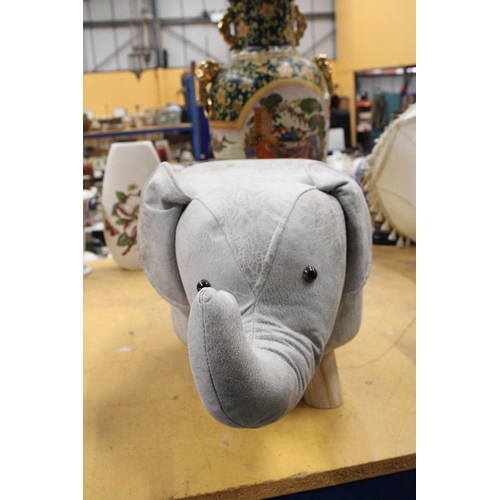 AN ELEPHANT FOOTSTOOL - AS NEW, HEIGHT 28CM, LENGTH APPROX 52CM