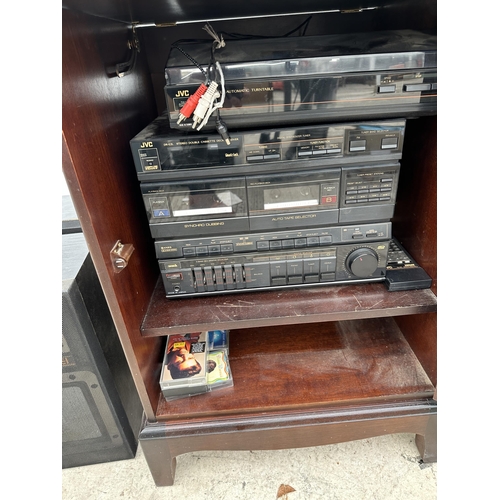 A JVC STEREO SYSTEM WITH CABINET AND A PAIR OF SPEAKERS