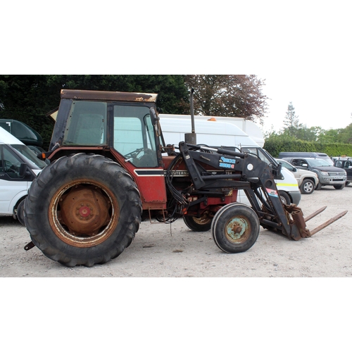 AN INTERNATIONAL 784 TRACTOR WITH 3360E LOADER PALLET FORKS GOOD BRAKES ...