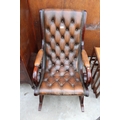 A CHESTERFIELD STYLE MAHOGANY ROCKING CHAIR