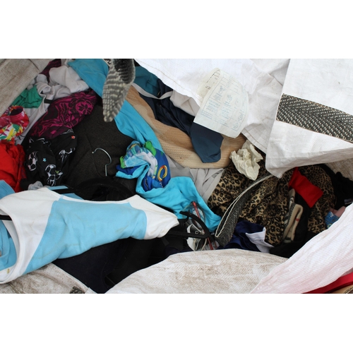 A LARGE ASSORTMENT OF CLOTHES