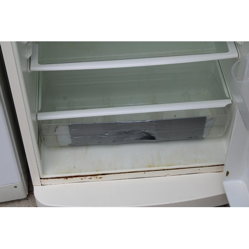 A RETRO STYLE CREAM FRIDGIDAIRE UPRIGHT FRIDGE