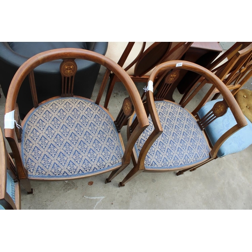 A PAIR OF EDWARDIAN MAHOGANY AND INLAID TUB CHAIRS ON FRONT TAPERING ...