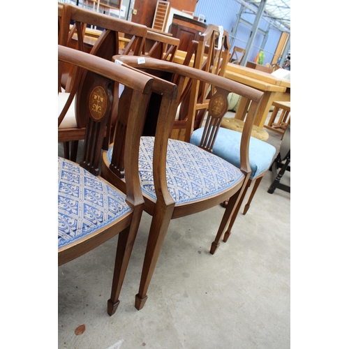 A PAIR OF EDWARDIAN MAHOGANY AND INLAID TUB CHAIRS ON FRONT TAPERING ...