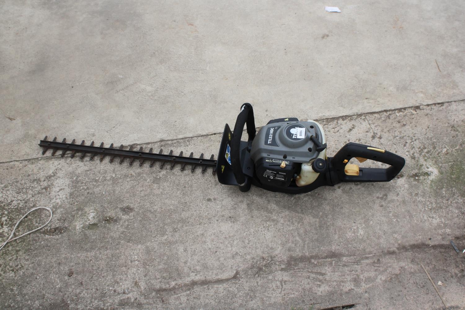 Titan petrol hedge trimmer store