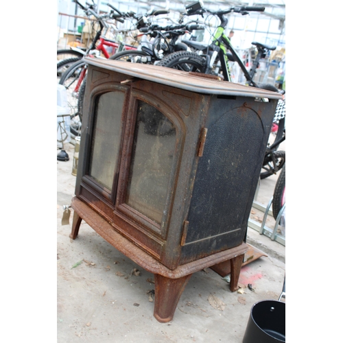 A HEAVY CAST IRON LOG BURNER